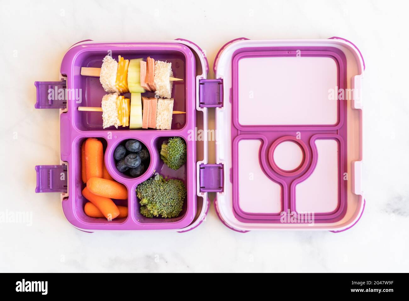 Flat lay. Healthy school lunch with kebab sandwich and vegetables in ...