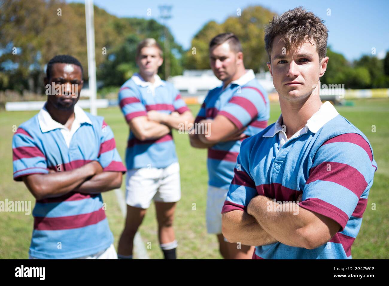 Portrait of confident players with arms crossed Stock Photo - Alamy