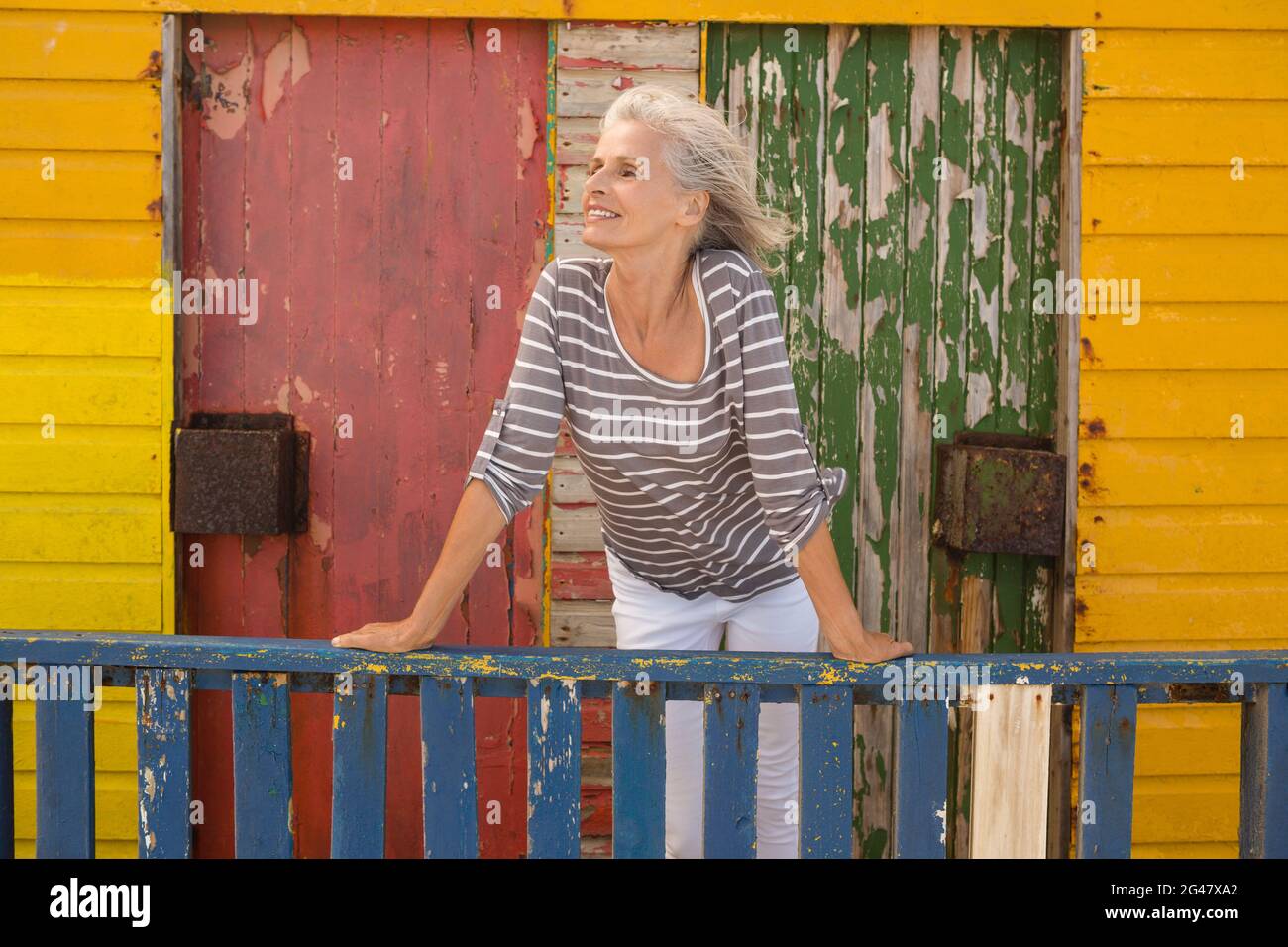 Leaning on wood railing hi-res stock photography and images - Alamy