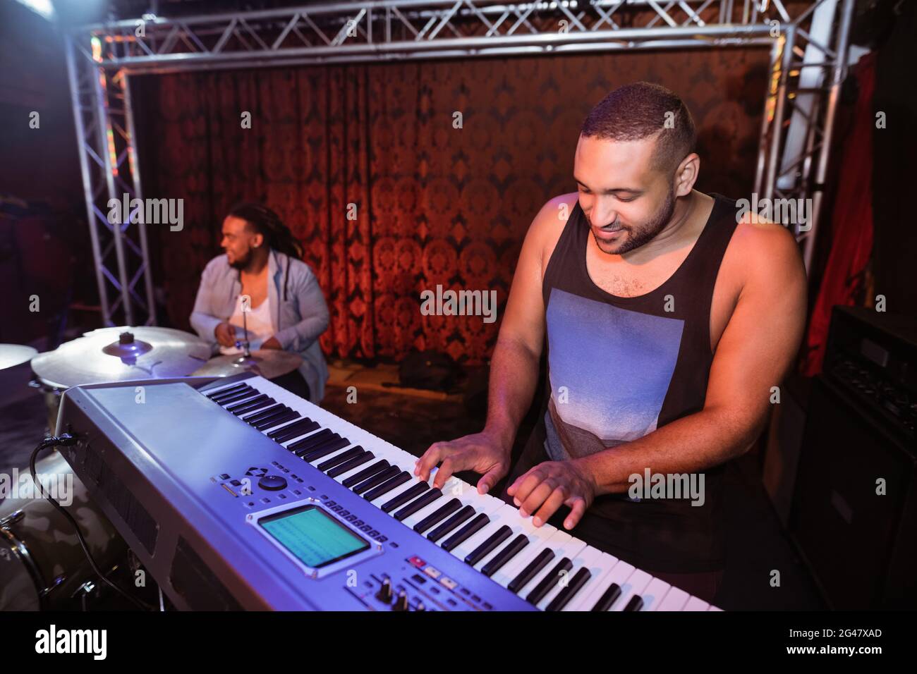 Musicians performing on stage during music festival Stock Photo - Alamy