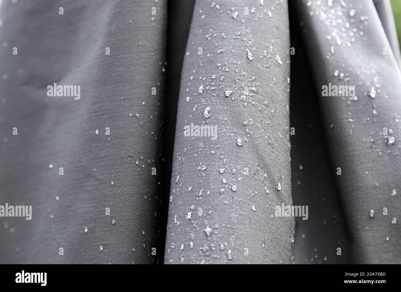 Rain-wet protective fabric detail Stock Photo - Alamy
