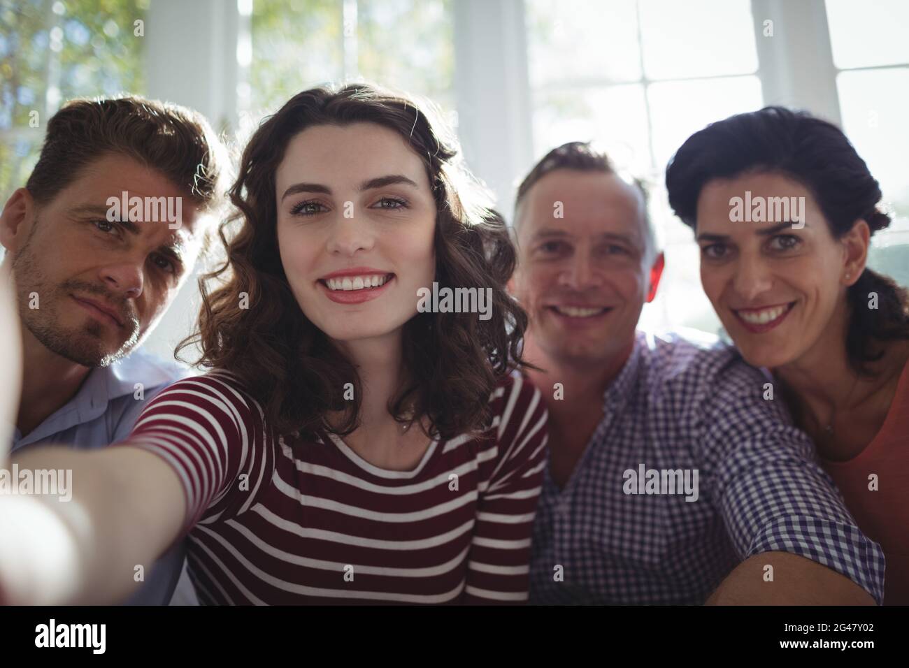 Joyful group mature friends sitting hi-res stock photography and images ...