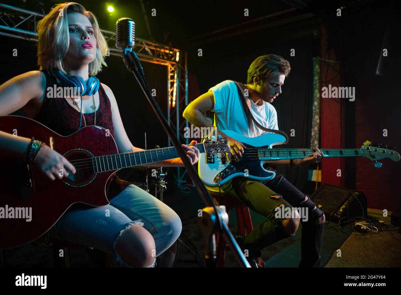 Band performing on stage Stock Photo - Alamy