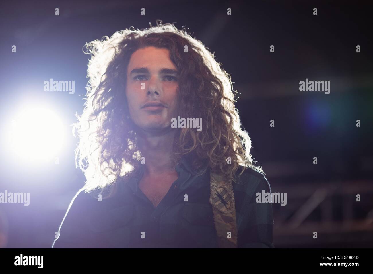 Guitarist musician adult curly hi-res stock photography and images - Alamy