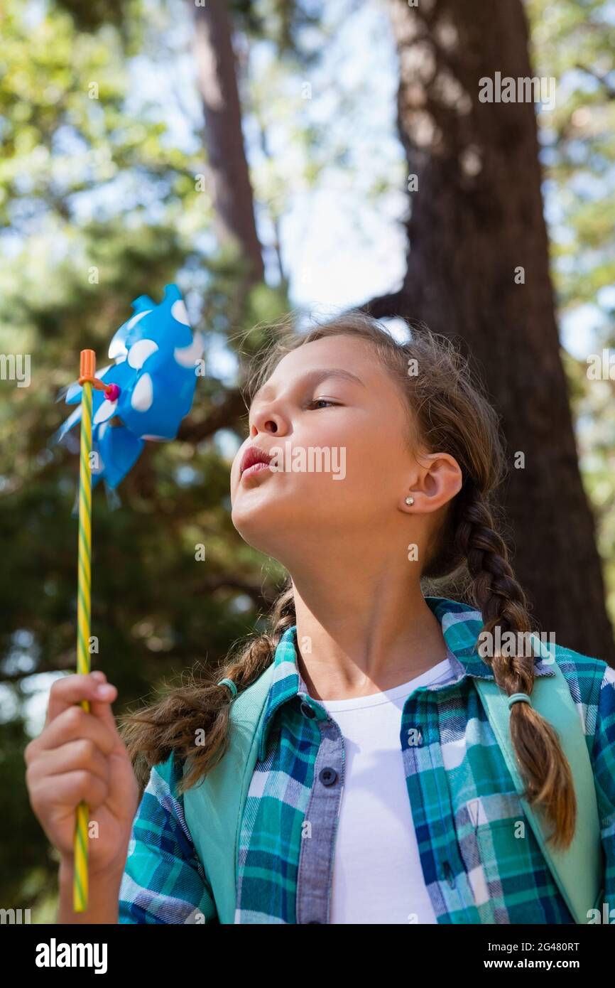 Girl with a pinwheel hi-res stock photography and images - Alamy