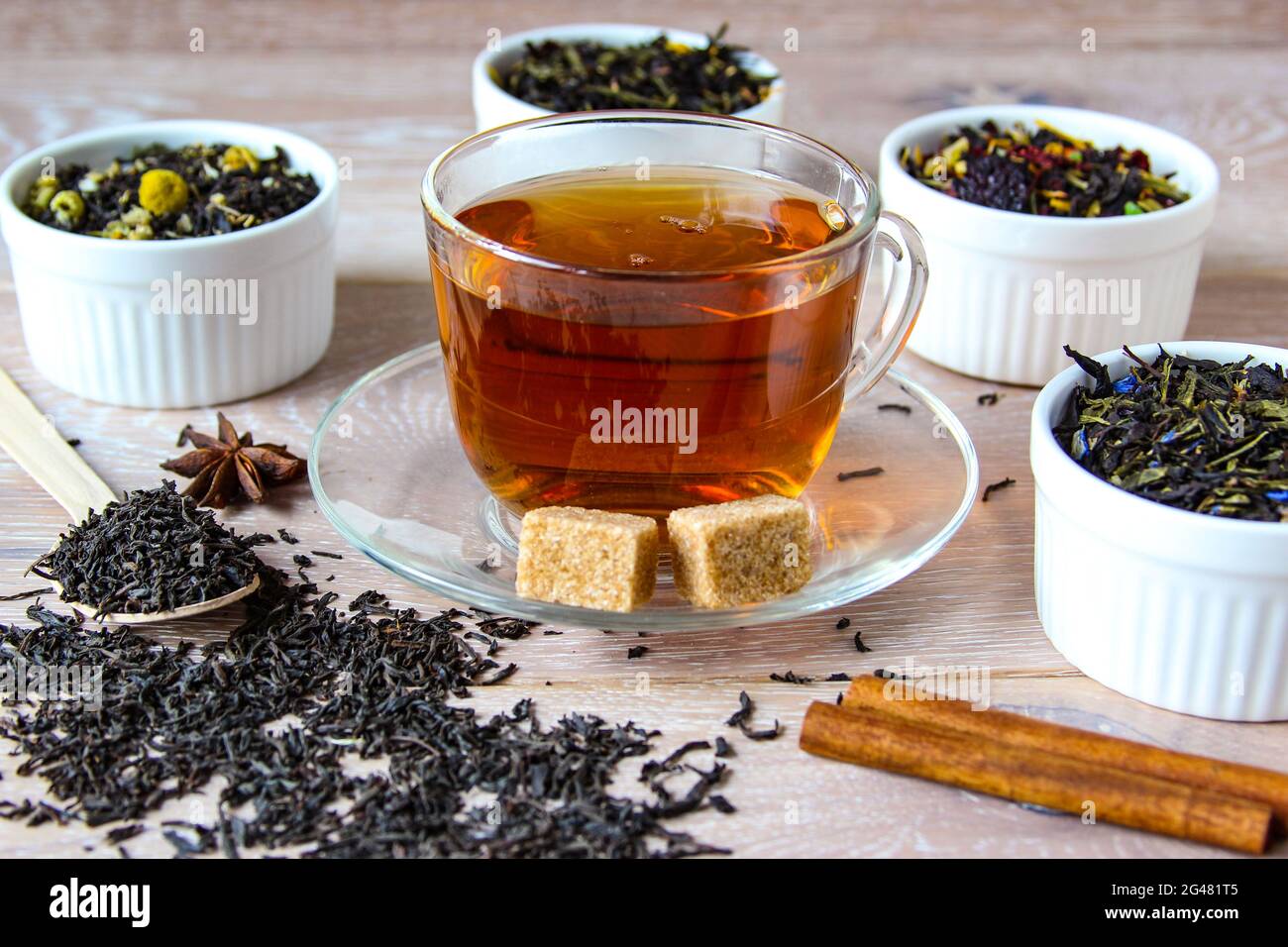 Tea assortment. Various kinds of tea. Prepared tea in a cup with sugar ...