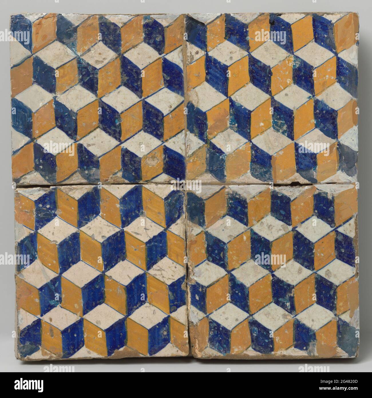 Four tiles with block pattern. Four tiles field (2 x 2) each with a ...