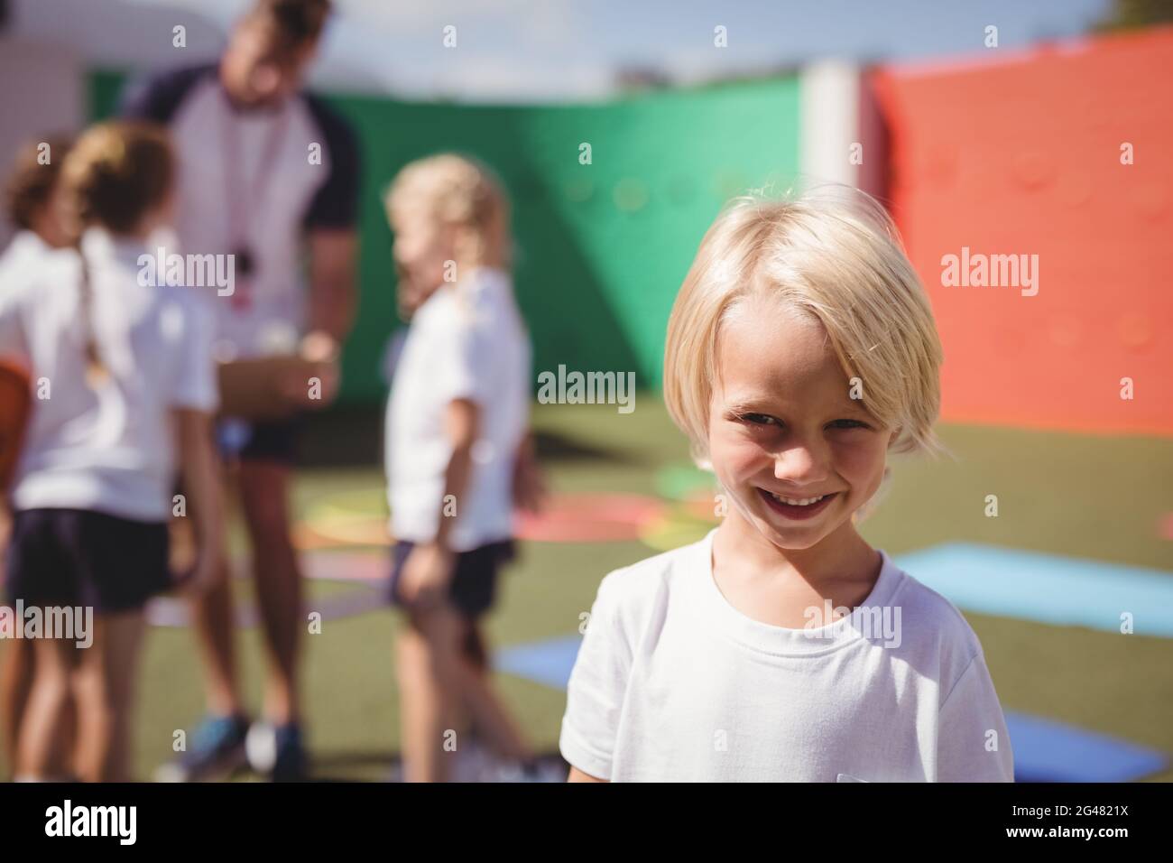 Happy schoolgirl in uniform Stock Photo - Alamy