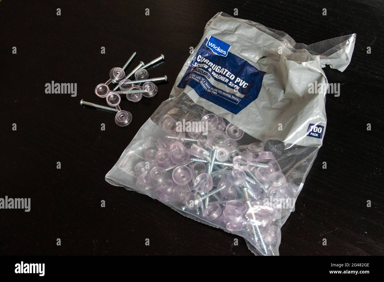 Corrugated PVC screws and plastic caps Stock Photo - Alamy
