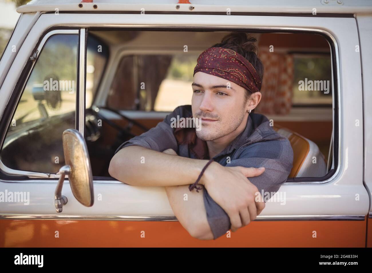Thoughtful man in van Stock Photo - Alamy