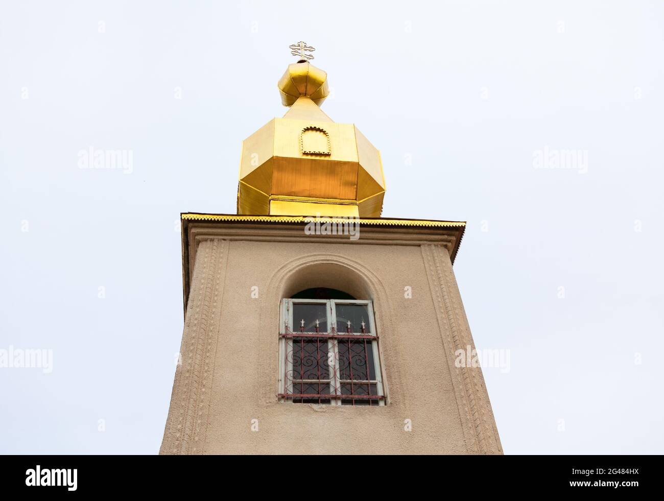 Steeple with golden dome . Cross on the church top Stock Photo - Alamy