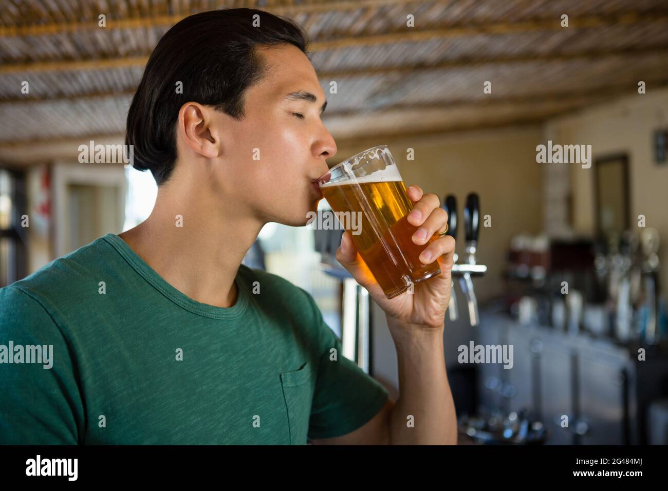 Man drinking beer Stock Photo - Alamy