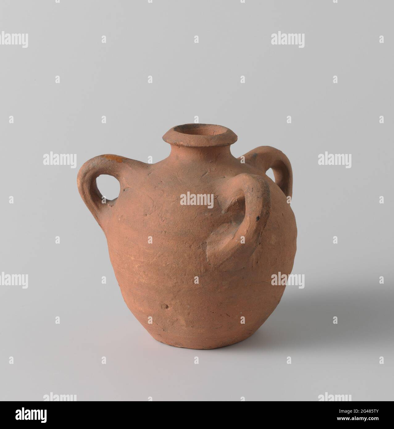 Fire pot. Fire or stink pot of pottery with three ears Stock Photo - Alamy