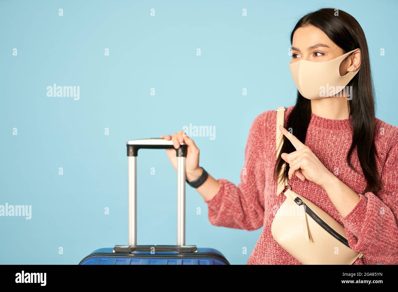 Pretty woman in anti-virus face mask enjoying the trip Stock Photo - Alamy