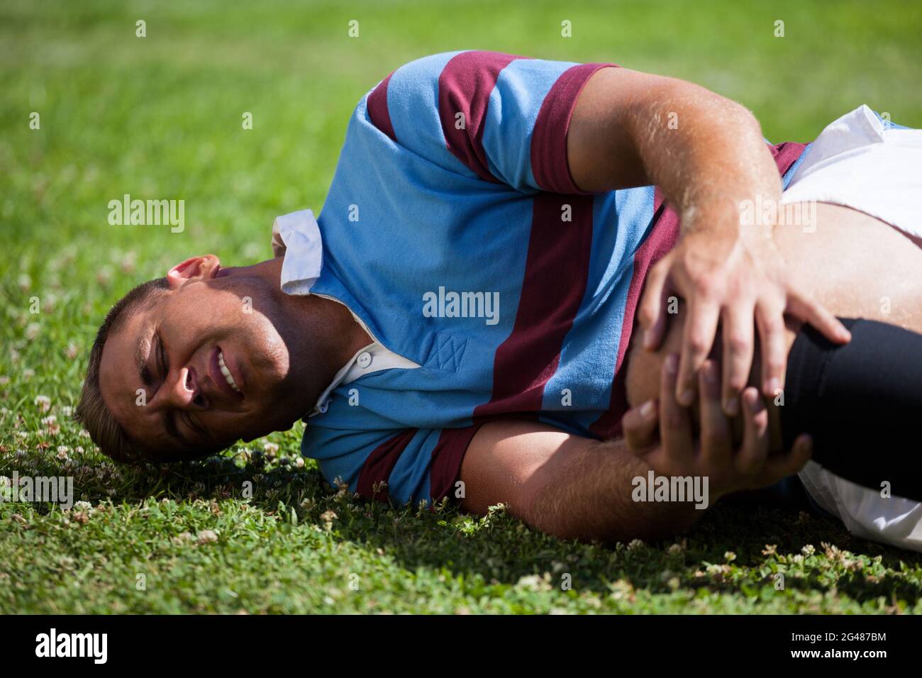 Young athletic man lying down hi-res stock photography and images - Alamy