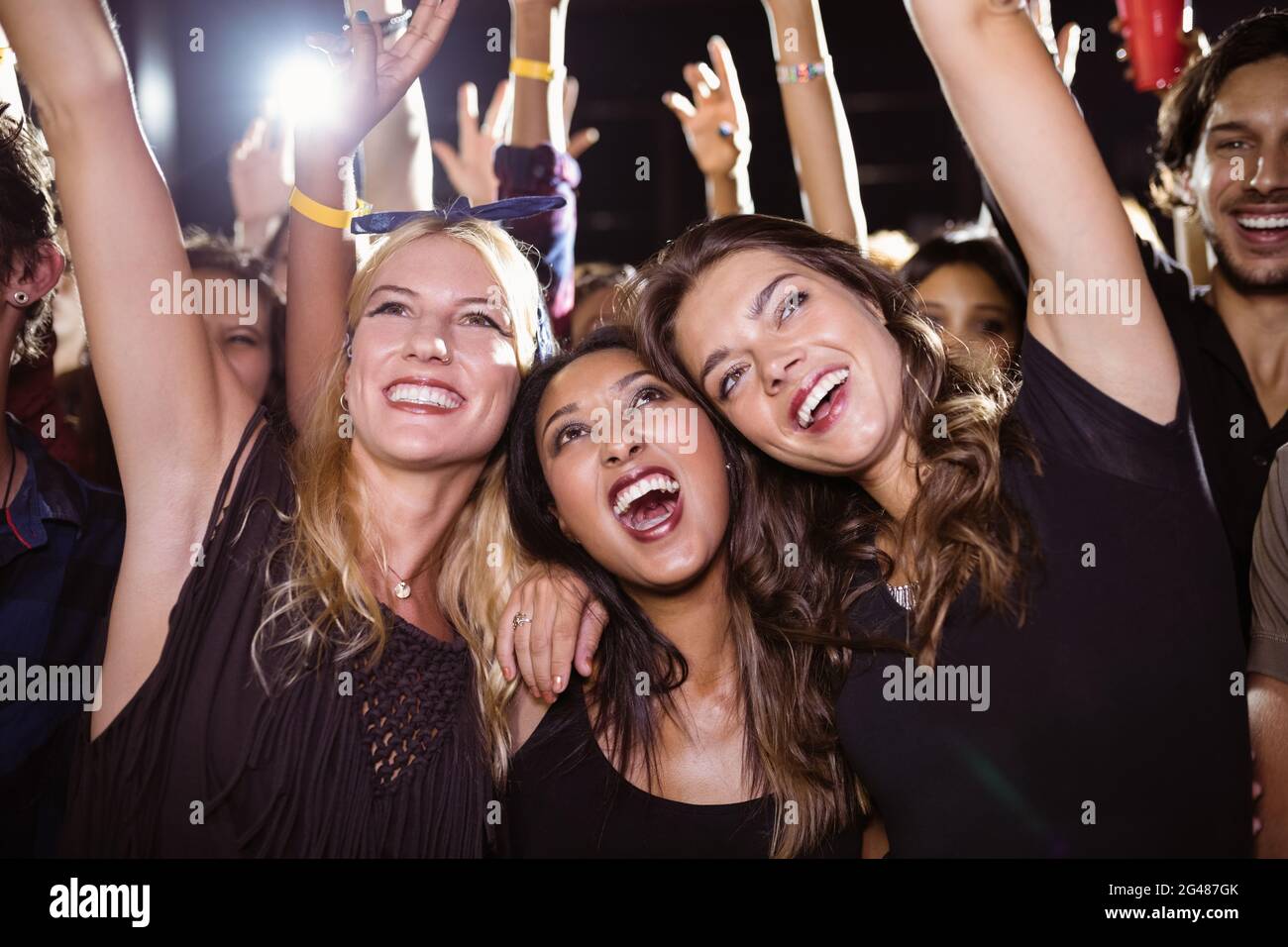 Female friends enjoying music hi-res stock photography and images - Alamy