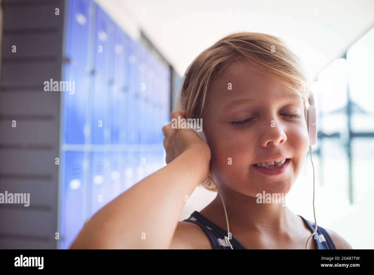 School standing student eyes closed hi-res stock photography and images ...