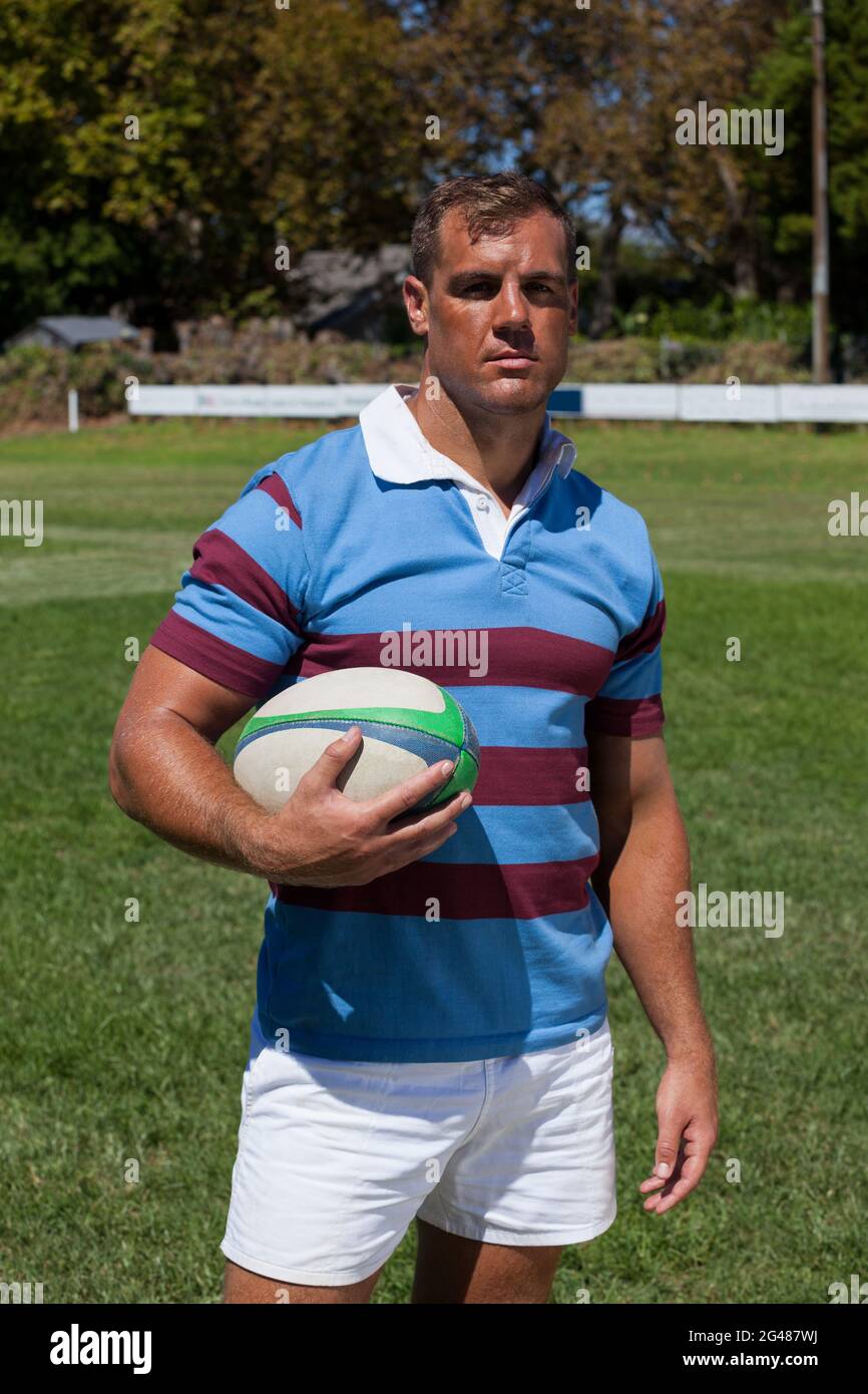 Rugby player standing ball hi-res stock photography and images - Alamy