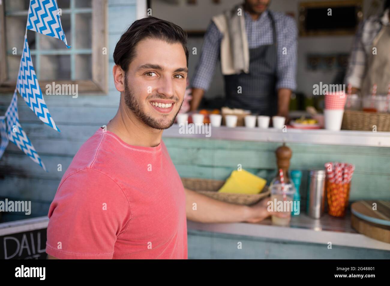 Man standing at counter hi-res stock photography and images - Alamy