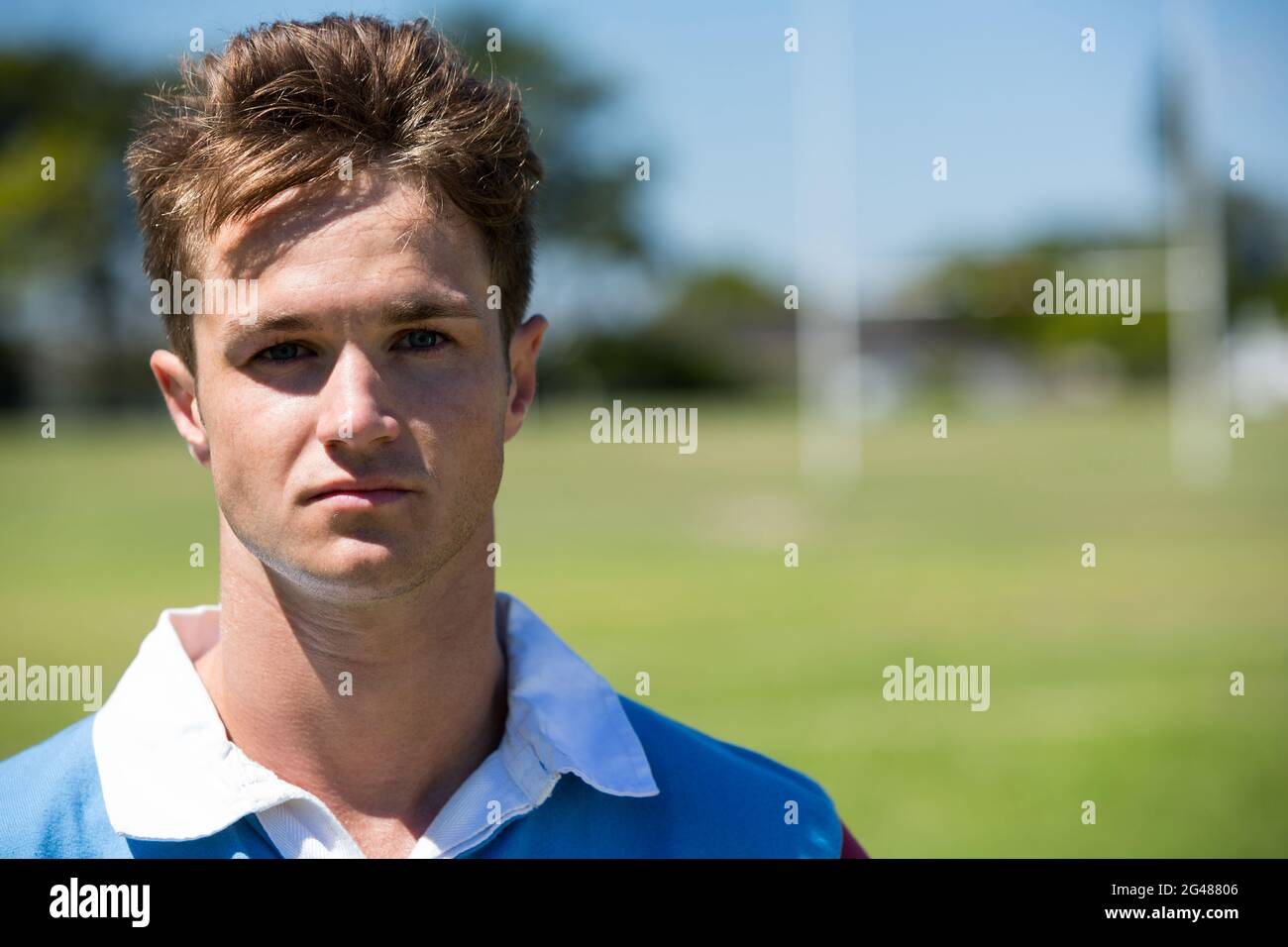 Portrait of confident rugby player Stock Photo - Alamy