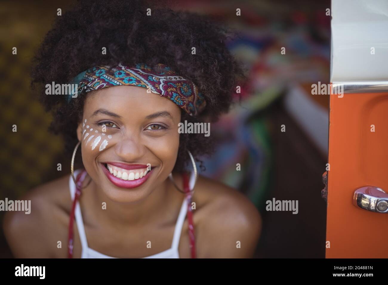 Joyful mixed race woman curly hi-res stock photography and images - Alamy