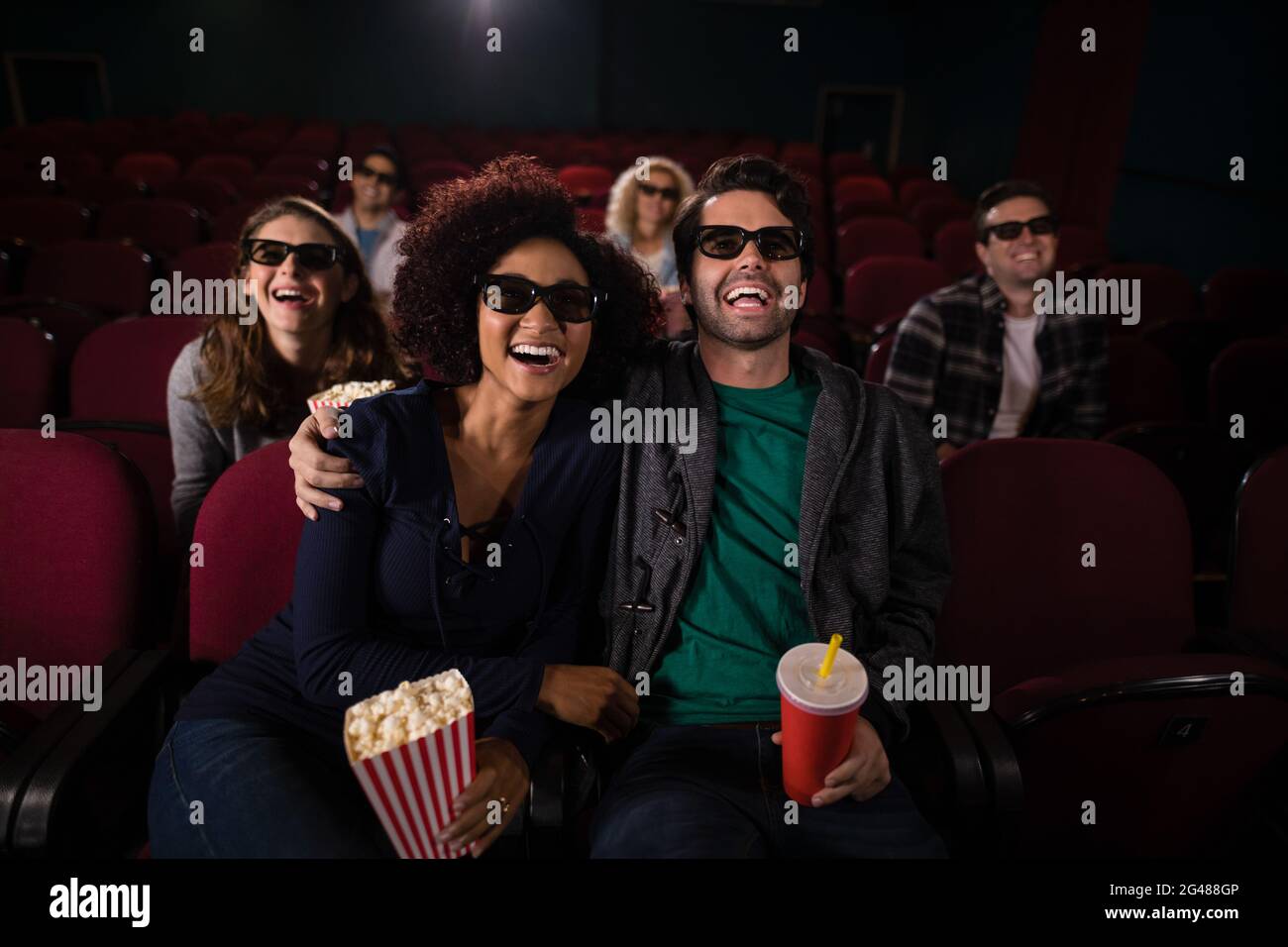 Group of people watching movie Stock Photo - Alamy