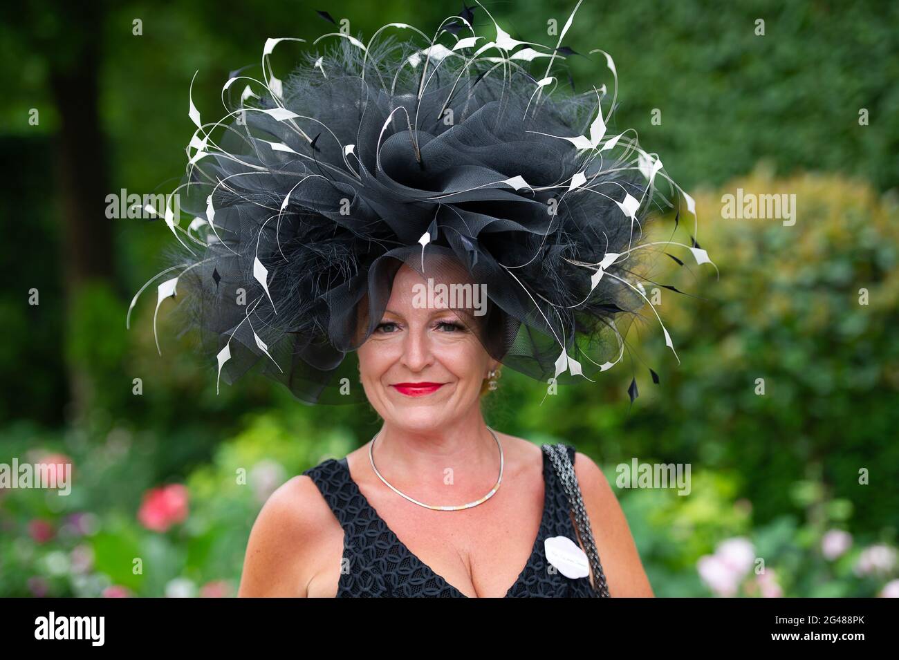 Ascot, Berkshire, UK. 19th June, 2021. Millner Viv Jenner wears a large ...