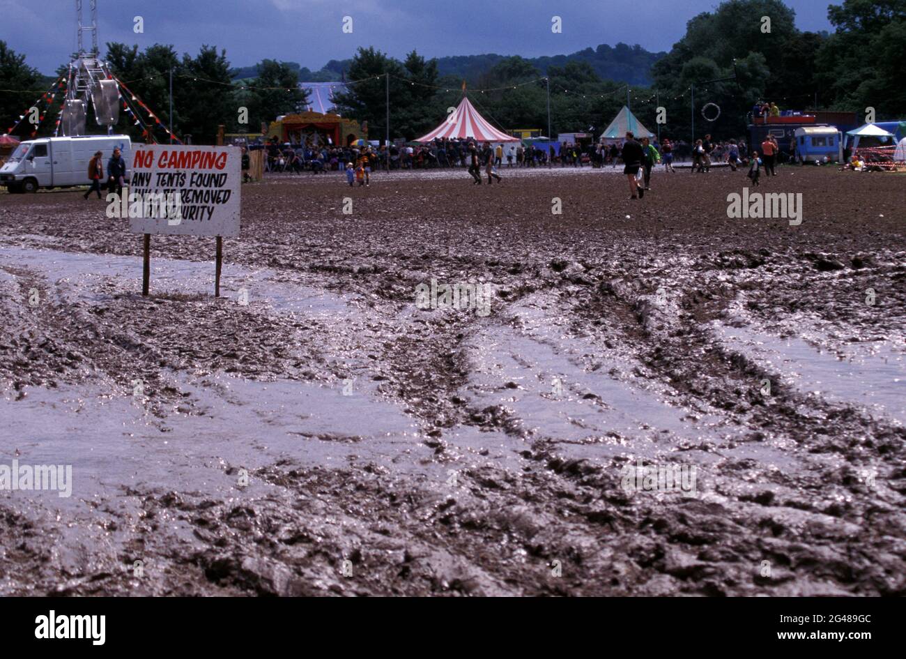 Mud field with No Camping placard in Glastonbury 1998 festival, Pilton ...