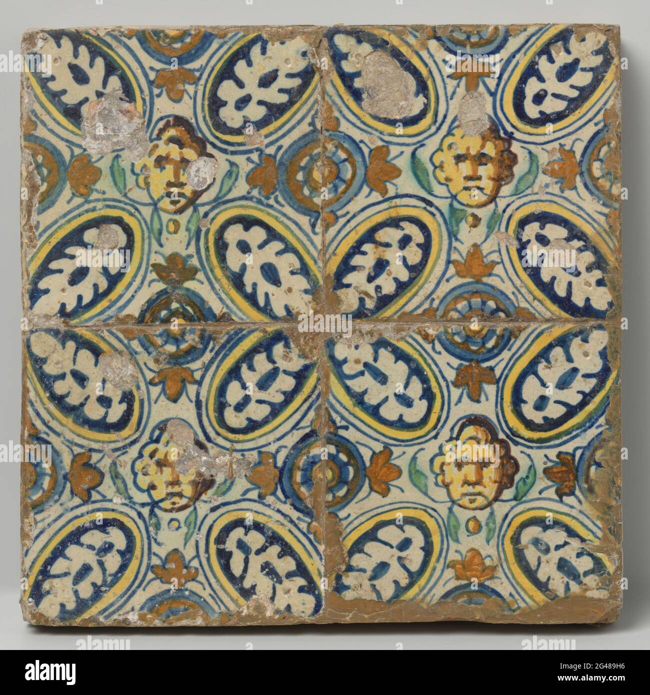 Field of four tiles with masks. Four tiles (2 x 2) each with a multi ...