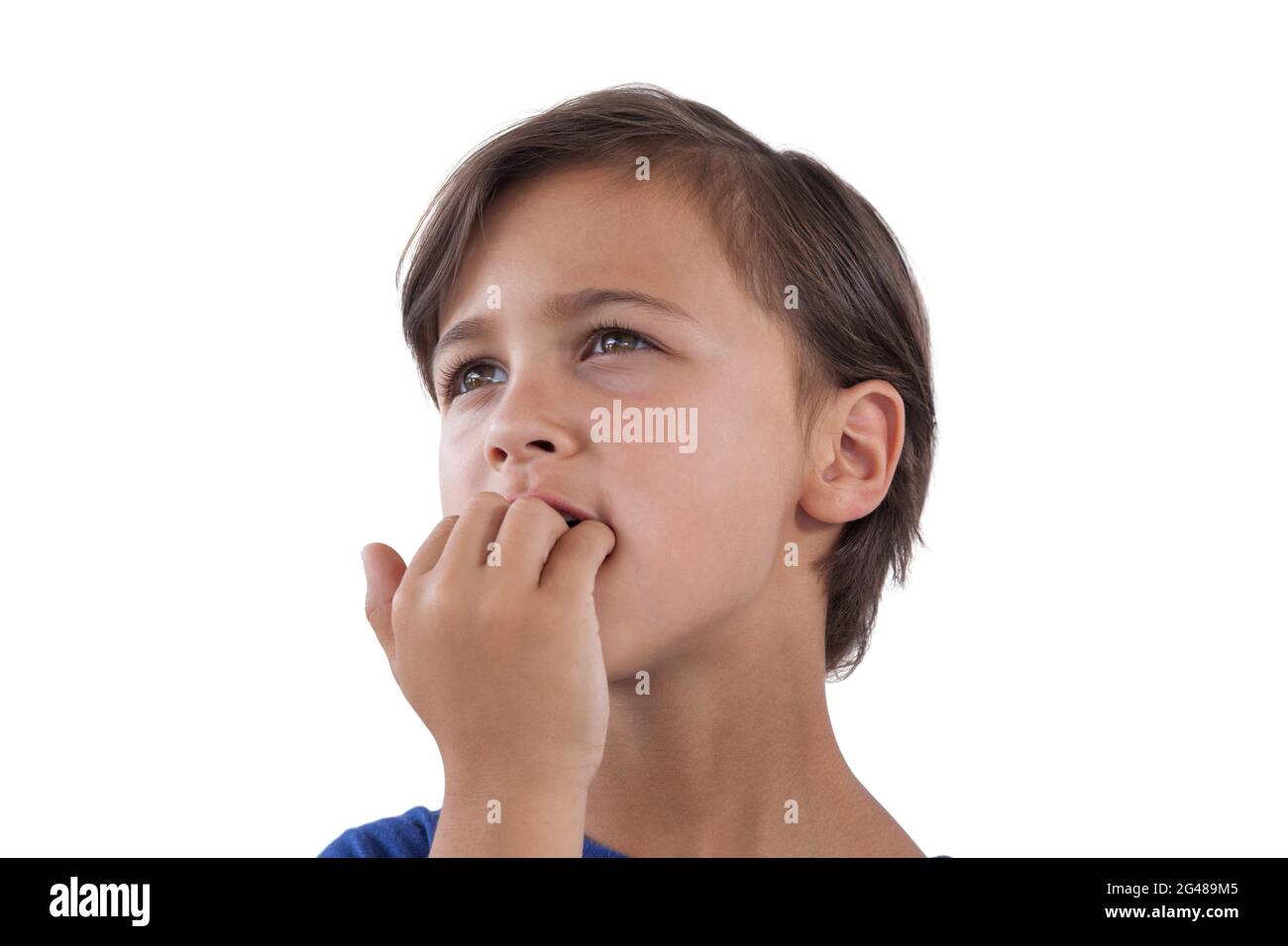 Thoughtful boy biting finger Stock Photo - Alamy