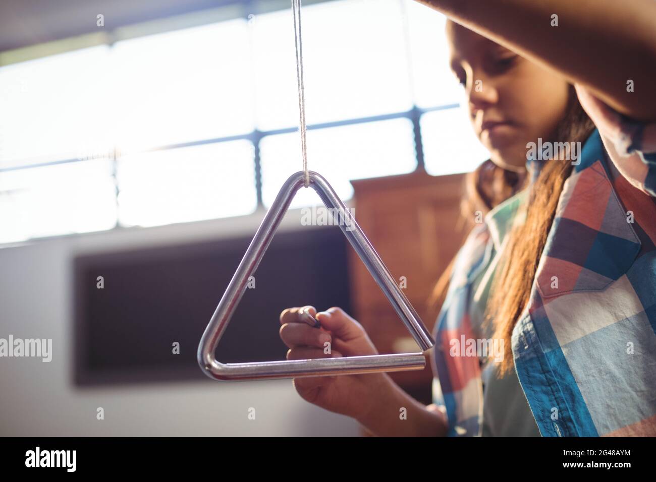 Triangle instrument classroom hi-res stock photography and images - Alamy