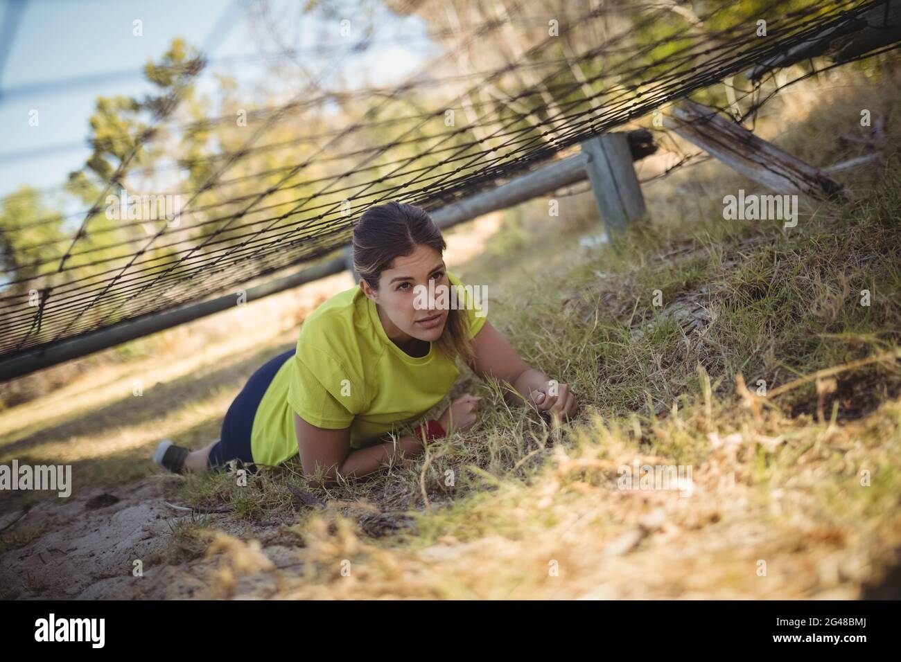 Crawling under obstacle net person hi-res stock photography and images ...