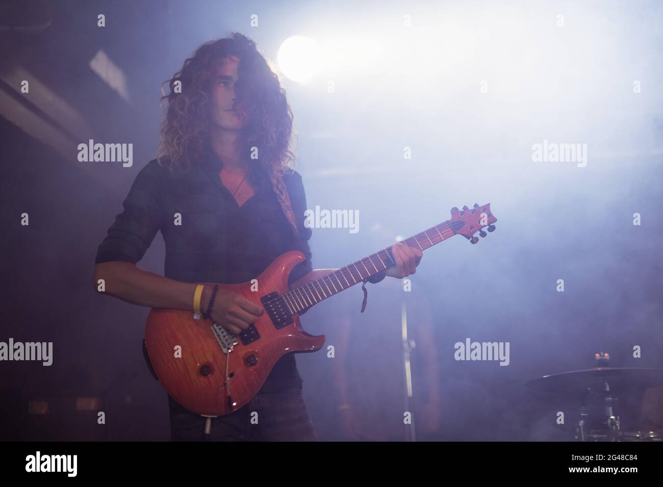 Guitarist musician adult curly hi-res stock photography and images - Alamy