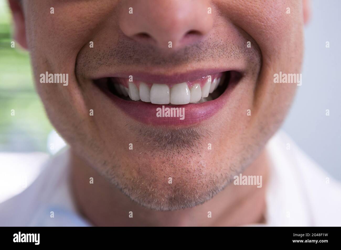 Smiling lips close up man hi-res stock photography and images - Alamy