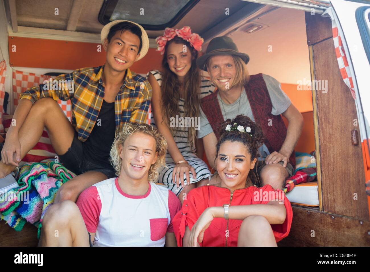 Portrait of smiling friends together in camper van Stock Photo - Alamy