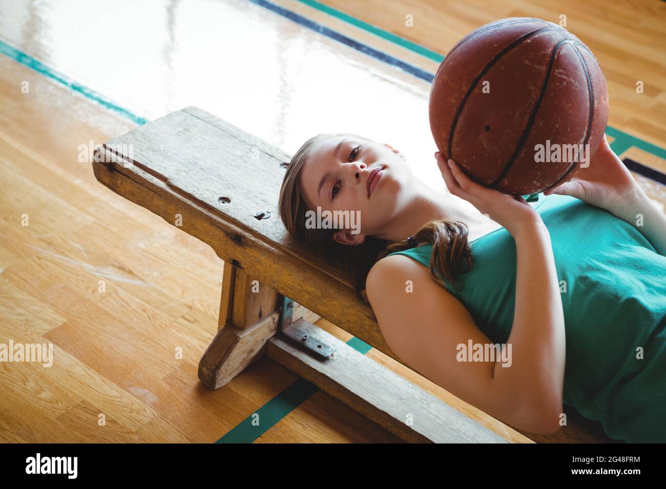 Caucasian female basketball player resting hi-res stock photography and ...