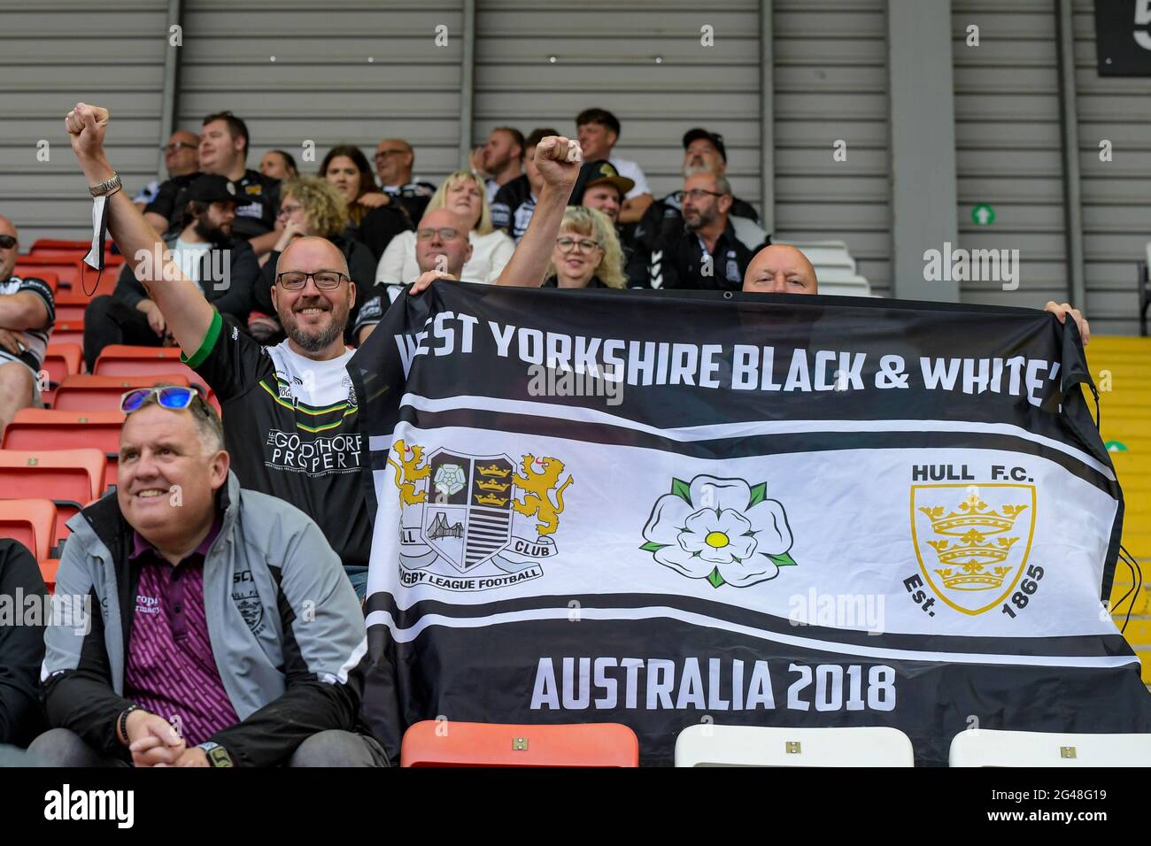 A Hull FC fan displays their flag during the game Stock Photo - Alamy