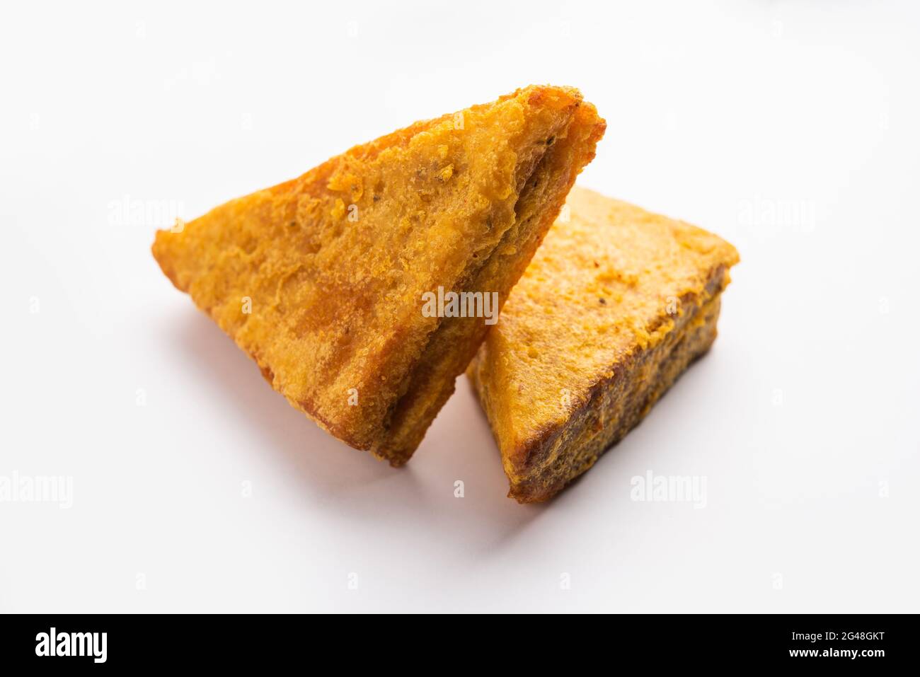 Sandwich Bread Pakora or triangle shape pakoda served with tomato ...