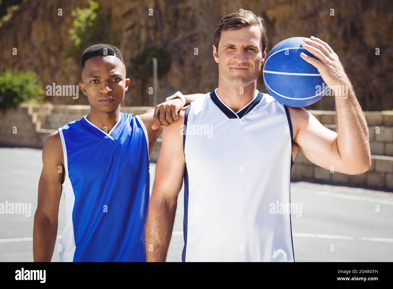 Portrait of male basketball players Stock Photo - Alamy