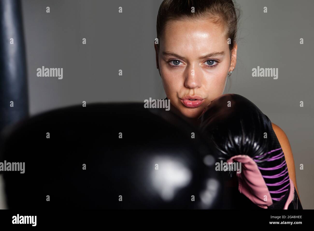 Practicing female boxing trainee hi-res stock photography and images ...