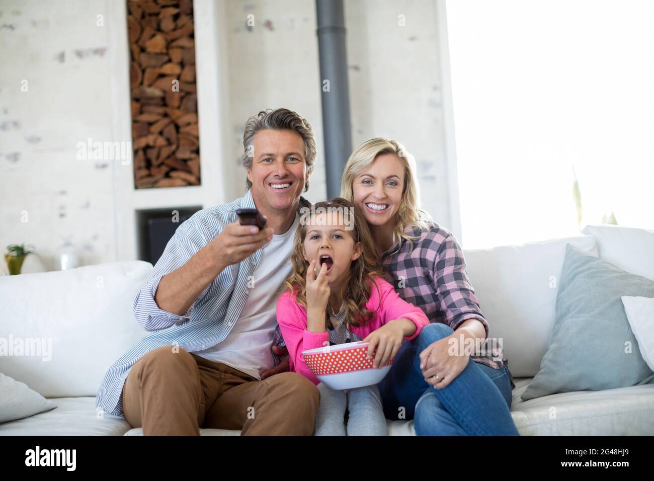 One mature woman in living tv hi-res stock photography and images - Alamy