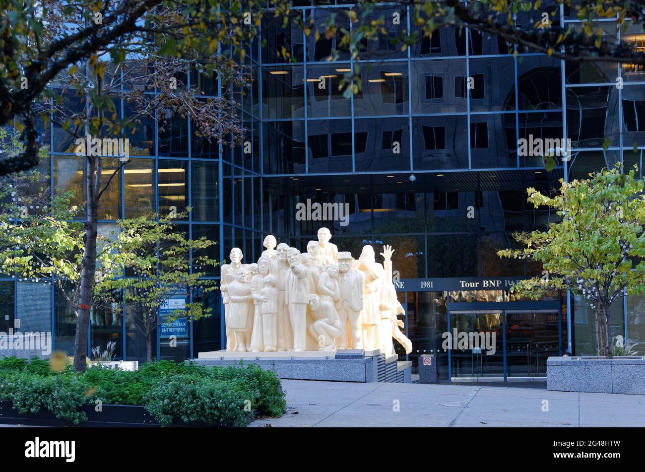 The Illuminated Crowd sculpture in front of the entrance to the BNP ...