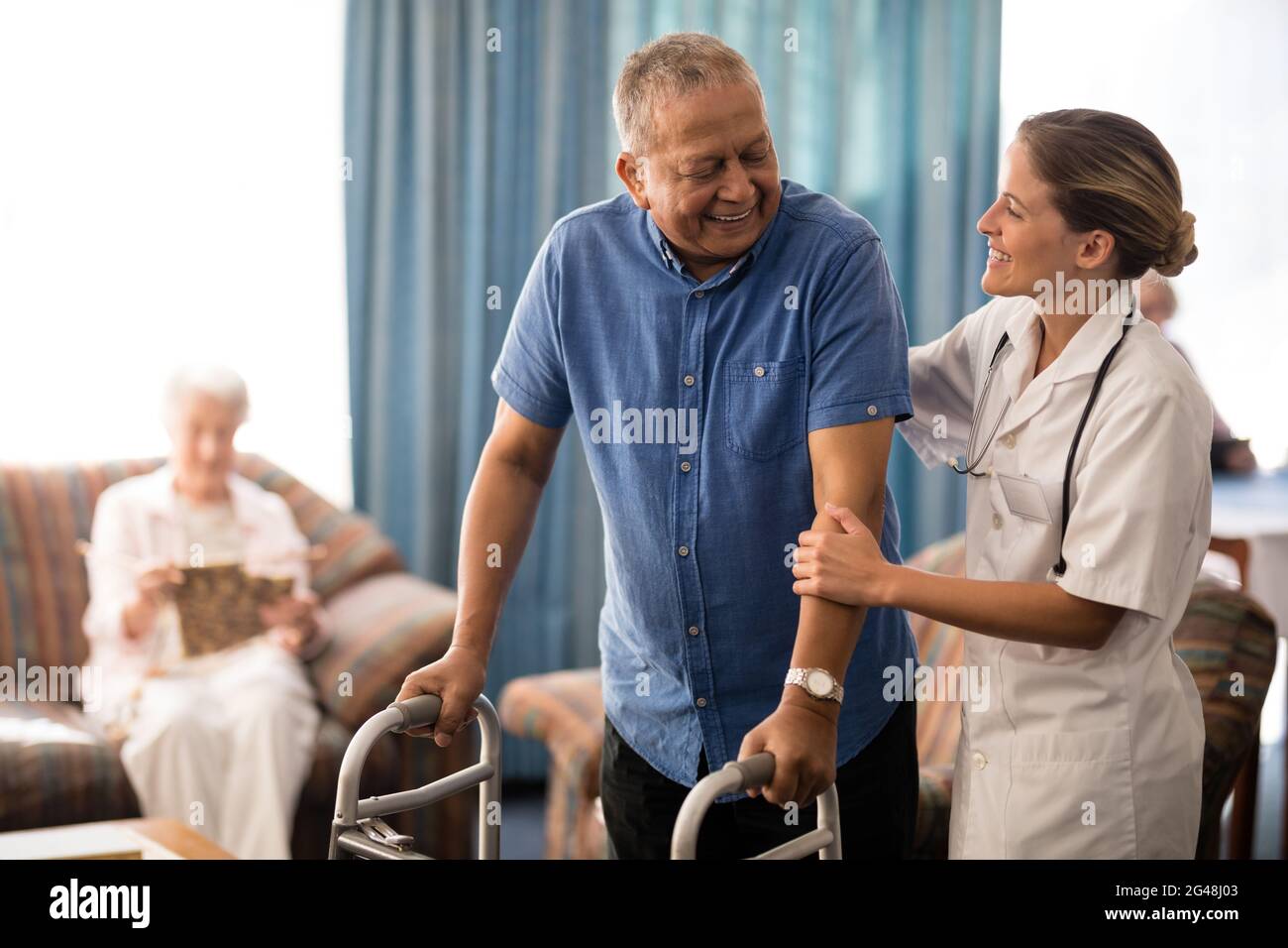 Man sitting walker smiling hi-res stock photography and images - Alamy