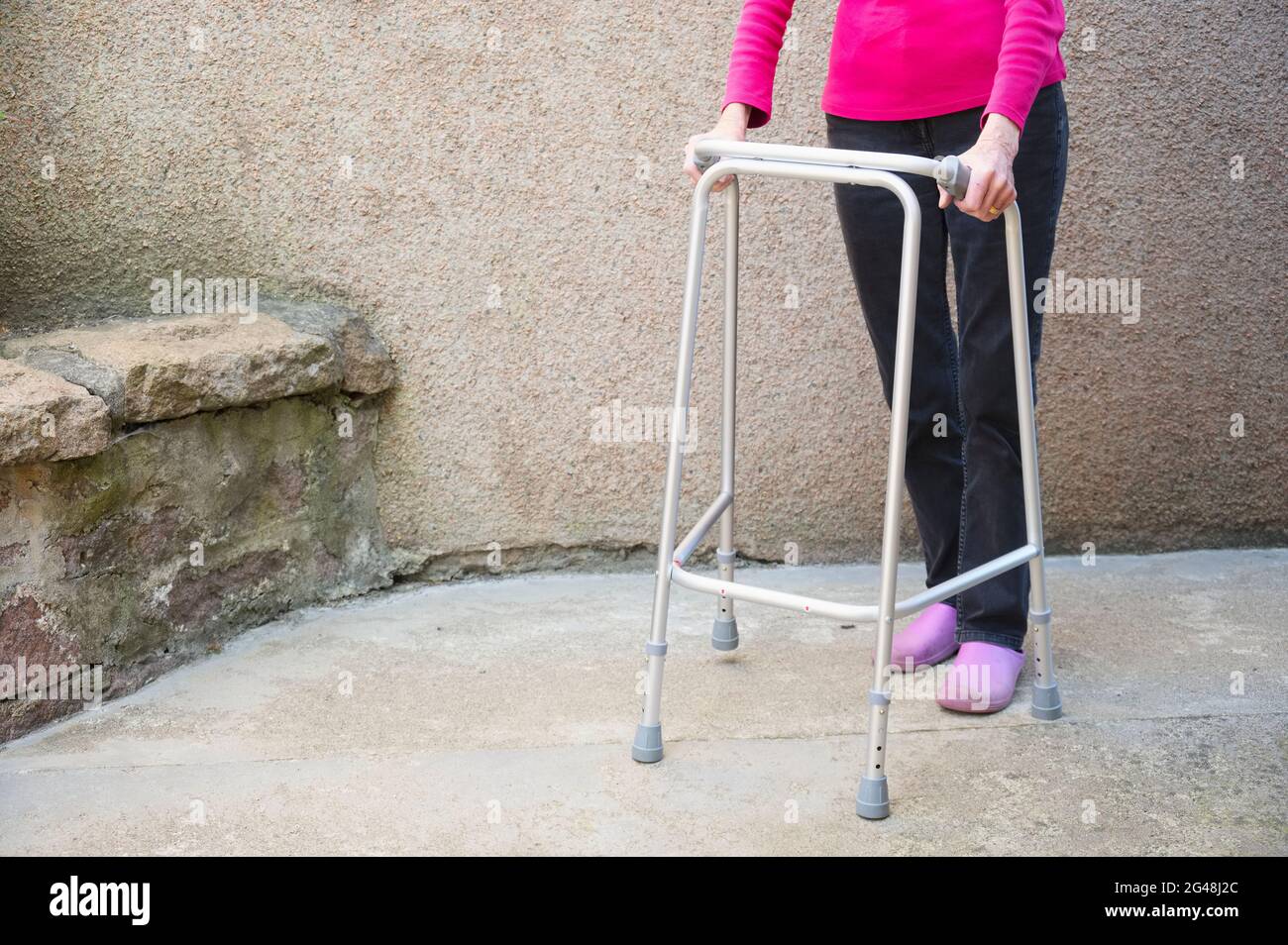 Old person walking frame hi-res stock photography and images - Alamy