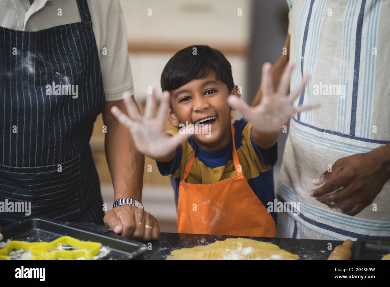 Son and father messy kitchen hi-res stock photography and images - Alamy