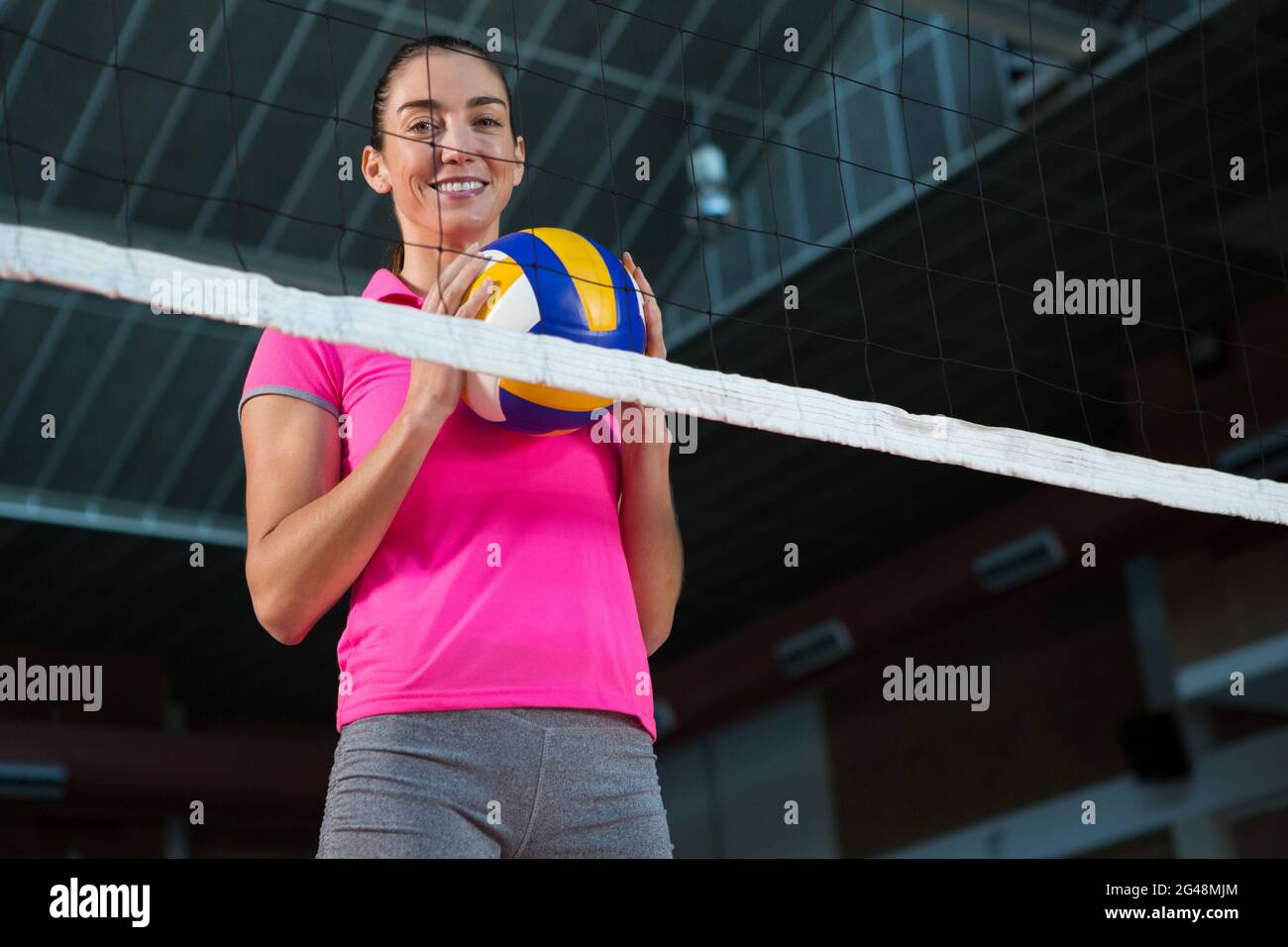 Professional sportsperson standing smiling holding hi-res stock ...