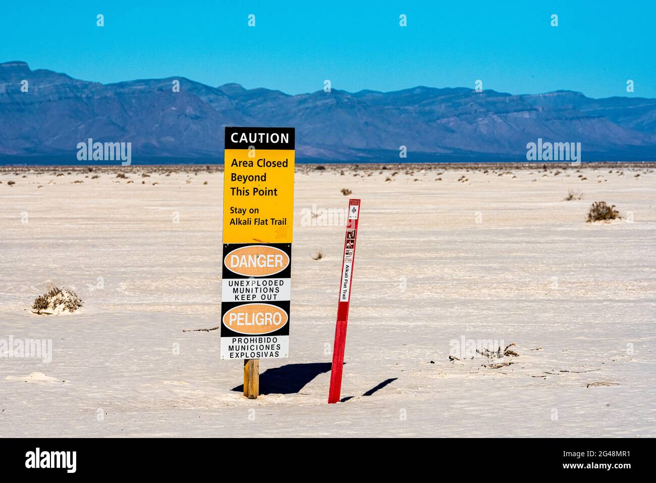 Danger Sign Stands Next to Alkali Flat Trail Marker in White Sands ...