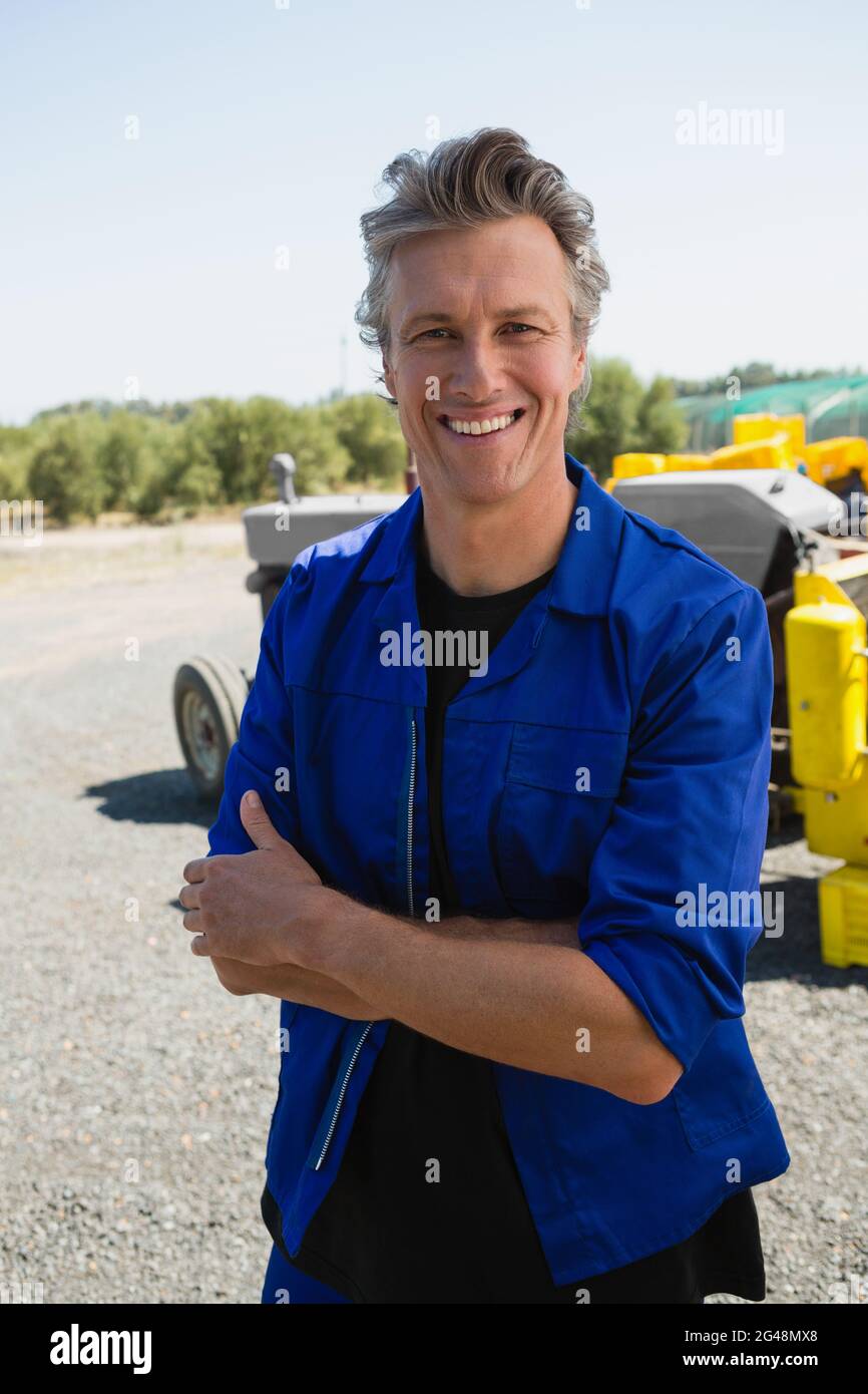 Farmer standing near tractor hi-res stock photography and images - Alamy