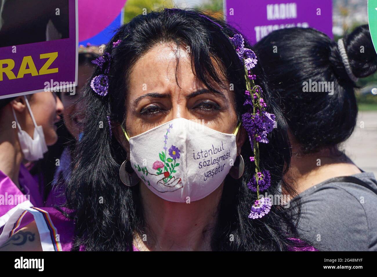 Istanbul, Turkey. 19th June, 2021. A woman wears a face mask written on ...