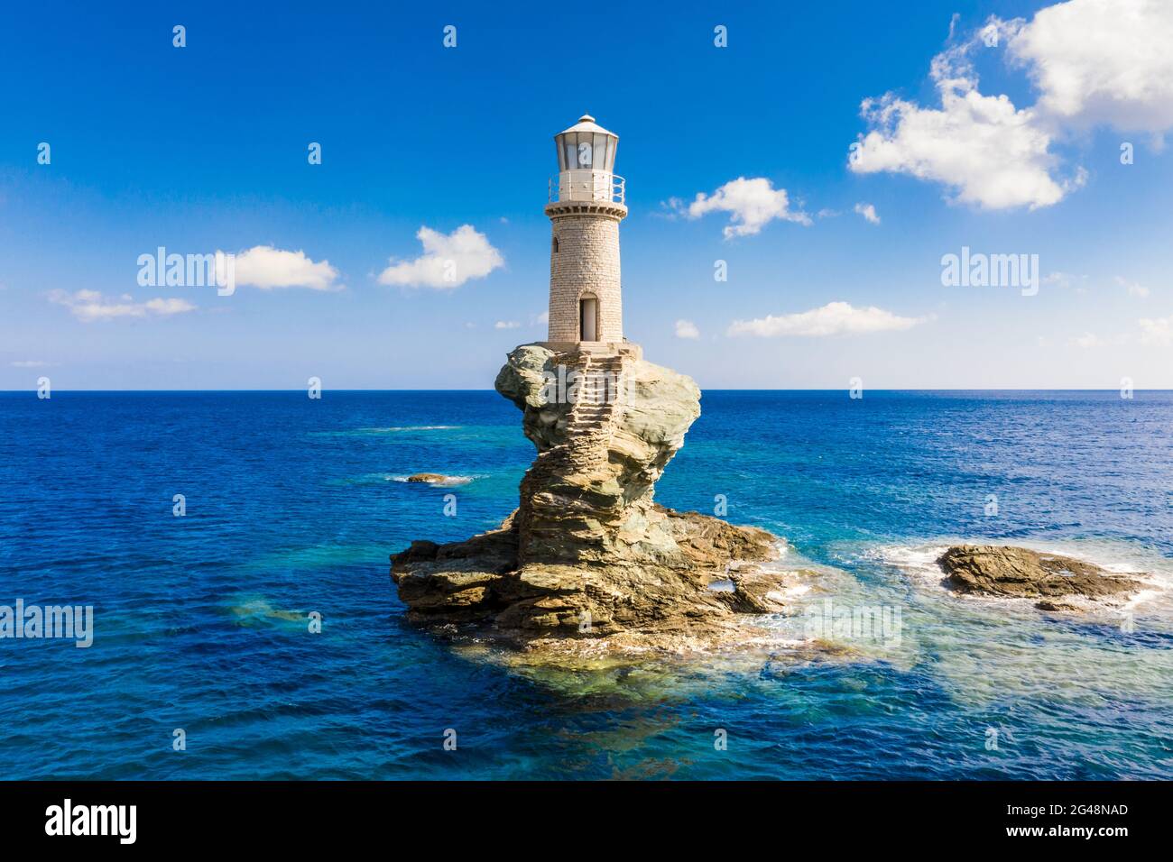 The beautiful Lighthouse Tourlitis of Chora at night. Andros island ...